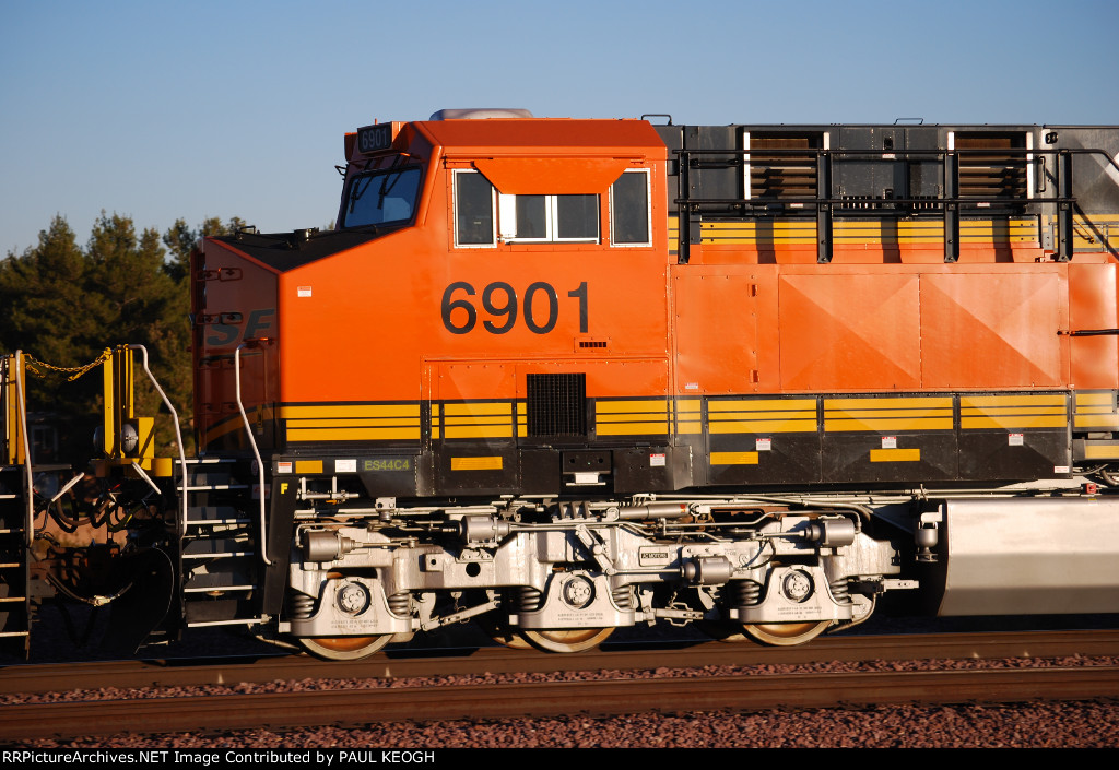 BNSF 6901 Heads east as the Sun Reflects off Her Very Brand New Swoosh Logo!!!